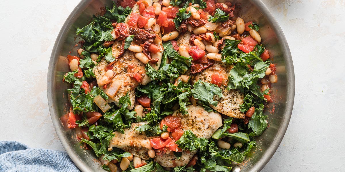 Tuscan Chicken with White Beans & Kale - Nourish and Fete
